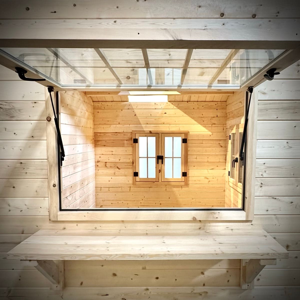 The Flip-Up Pass Thru Window™ - Sawmill Structures™