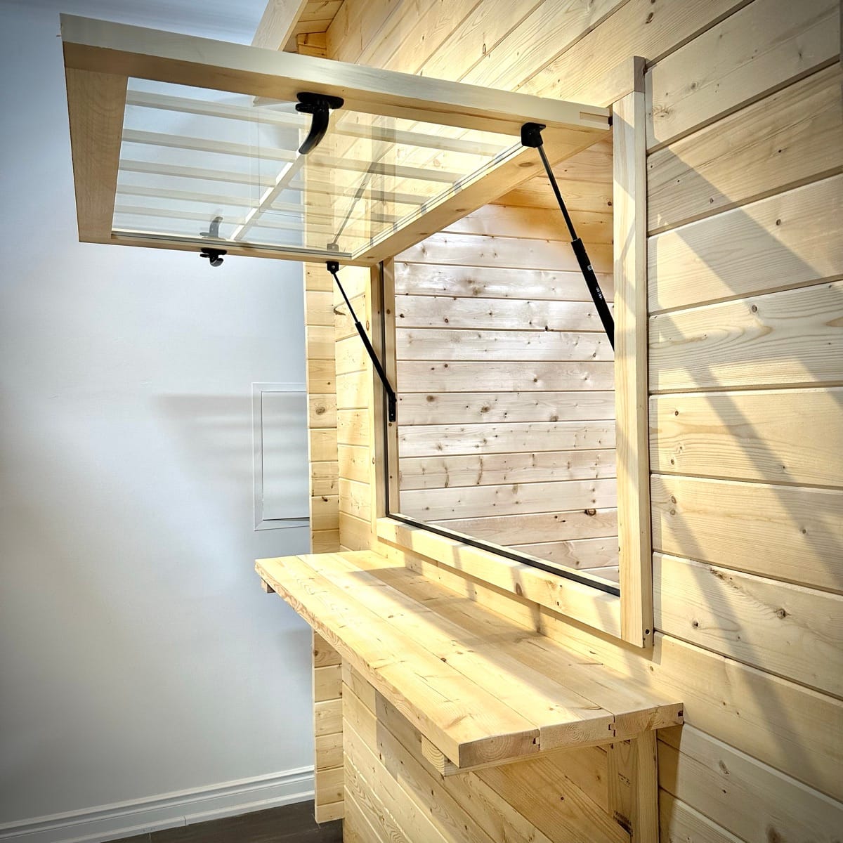 The Flip-Up Pass Thru Window™ - Sawmill Structures™