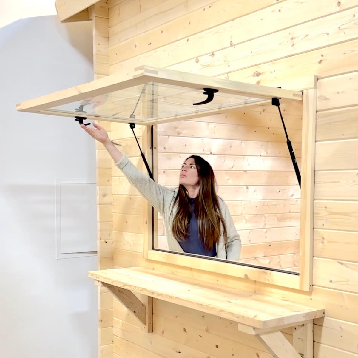 The Flip-Up Pass Thru Window™ - Sawmill Structures™