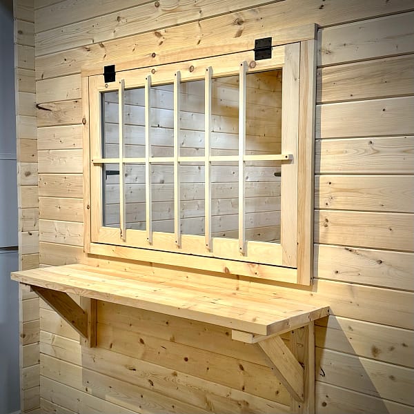 The Flip-Up Pass Thru Window™ Upgrade - Sawmill Structures™